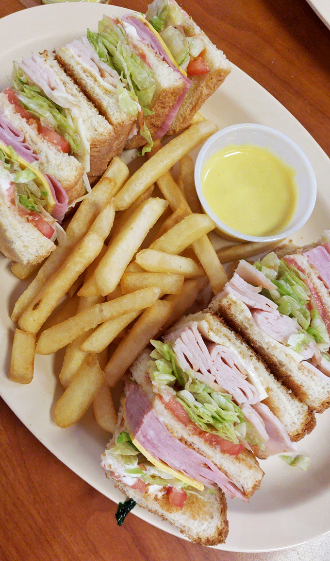 The club sandwich at Charlie's stands tall and proud, layers of fresh ingredients stacked between perfectly toasted bread &ndash; the architectural marvel of lunch options.