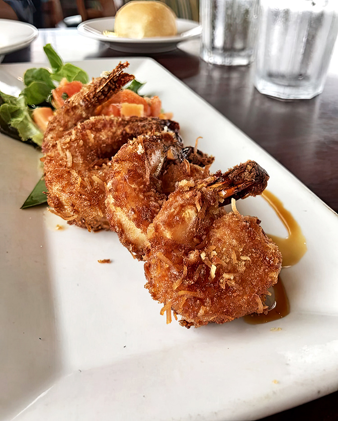 Coconut shrimp that delivers the tropical vacation your mouth has been waiting for – crispy, sweet, and substantial enough to silence conversation momentarily.
