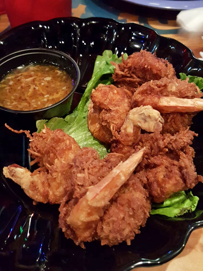 Crispy coconut shrimp that could convert any seafood skeptic. Served with a dipping sauce that perfectly balances sweet and tangy notes.