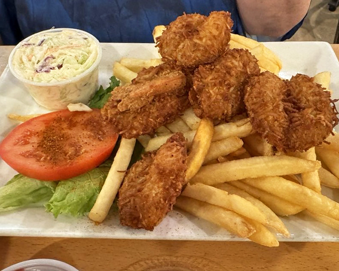 These coconut shrimp aren't just fried—they're transformed into tropical treasures with a golden crunch that would make a Caribbean vacation jealous.