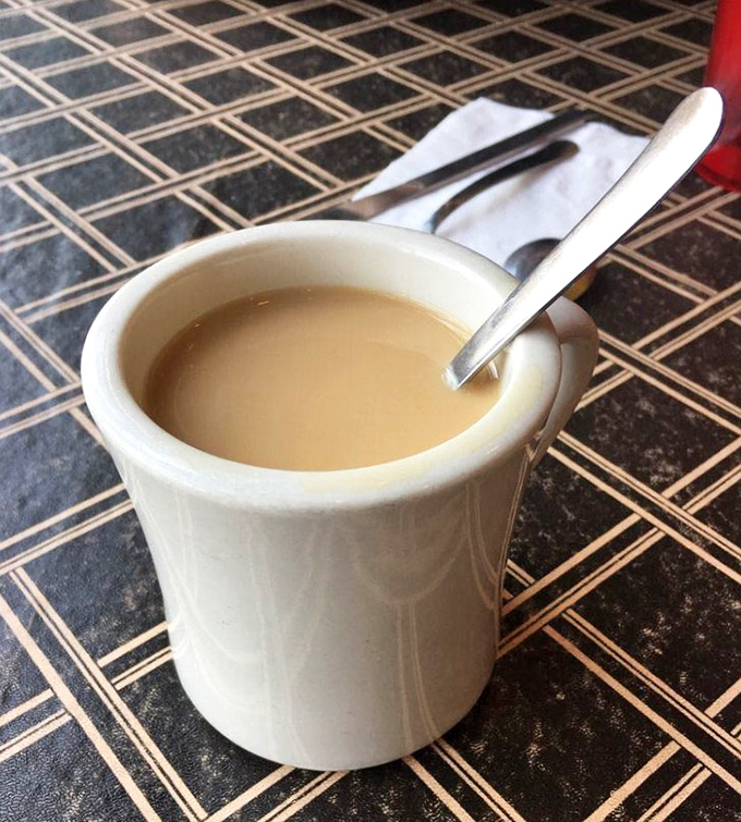 Pete's coffee comes in a sturdy mug that says, "Take your time, friend." The perfect companion for morning conversations or peaceful contemplation.