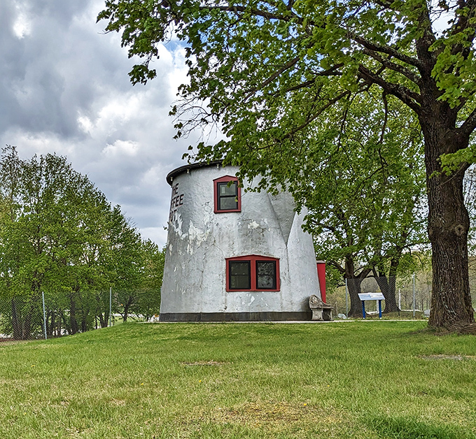 Spring greenery frames this peculiar landmark. The Coffee Pot looks particularly striking against nature's backdrop, like surrealism in 3D.