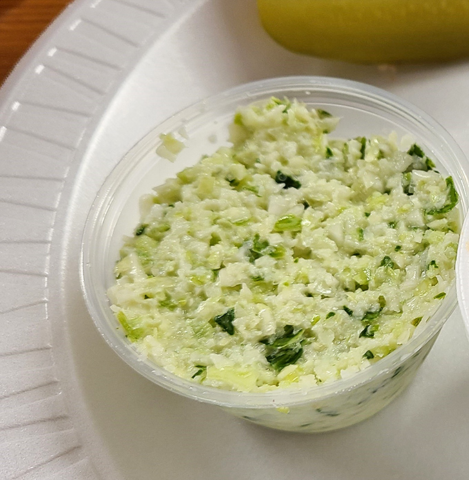 Cole slaw that knows its role &ndash; cooling, crunchy contrast to smoky meat. Not a mere side dish, but an essential supporting character in this BBQ drama.