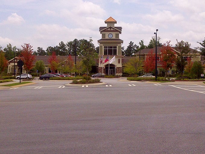 The clubhouse stands tall like a beacon of civilization, promising coffee, conversation, and countless activities just steps from your front door.