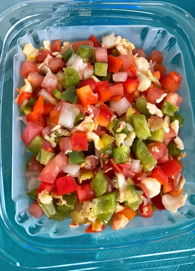 Conch ceviche: a colorful fiesta in a container. Fresh, vibrant, and exactly what your taste buds need after a day of Florida sun.