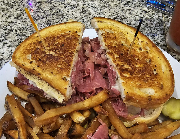 The Reuben reveals itself like a meaty treasure chest &ndash; corned beef piled high enough to make New York delis nod in respect.