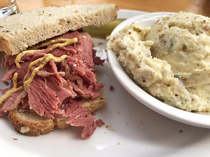 Corned beef so tender it practically surrenders at the sight of a fork, paired with potato salad that would make any deli counter proud.