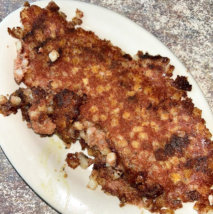 Corned beef hash with that perfect crispy exterior &ndash; the breakfast equivalent of finding a parking spot right in front of your destination.