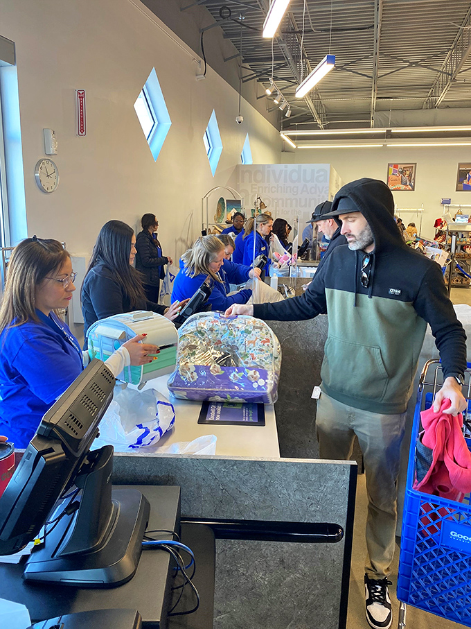 At the checkout counter, where treasures and their hunters part with a few dollars—the final step in the beautiful dance of secondhand shopping.