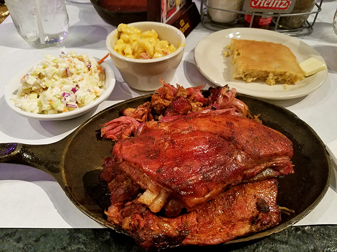 Country ribs served with classic sides that would make any Southern grandmother nod in approval. That cornbread isn't just a side&mdash;it's a sauce delivery system.