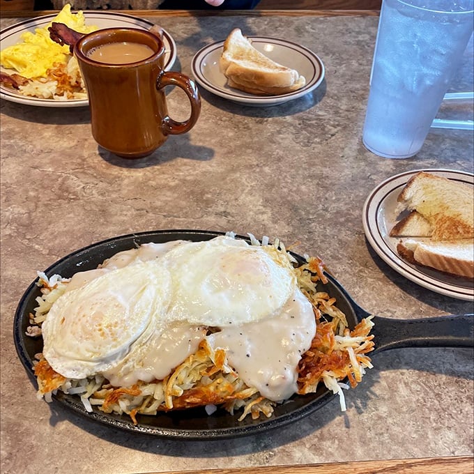 A skillet breakfast that laughs at your diet plans. Those eggs perched atop a mountain of hash browns are basically saying "resistance is futile."