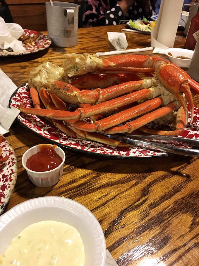 Snow crab legs arranged like nature's perfect puzzle&mdash;sweet meat waiting to be discovered by those patient enough to wield the crackers with purpose.