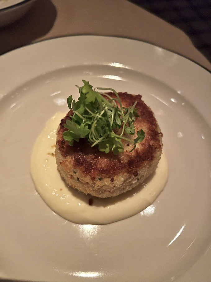 This crab cake isn't playing games&mdash;all crab, minimal filler, and a sauce that should be bottled and sold as liquid happiness.