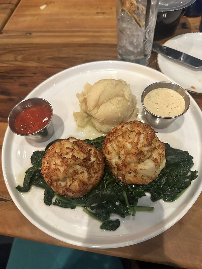 Maryland crab cakes that are all crab, no cake. Served on a bed of wilted spinach, they're the state treasure that doesn't require a metal detector.