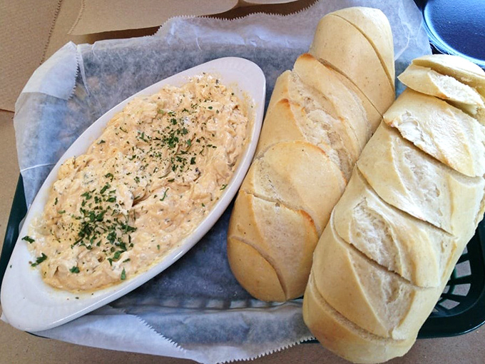 Crab dip that could make a New Englander question their chowder loyalty. Paired with crusty bread, it's the ultimate Maryland handshake.