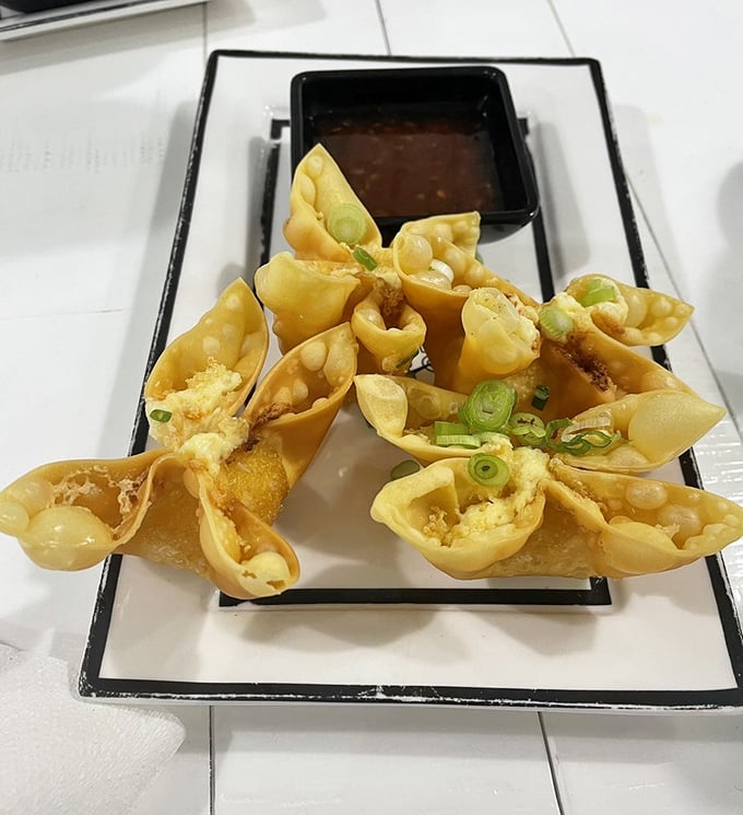 Crab Rangoon: where cream cheese meets the sea in crispy wonton jackets. These little flavor bombs are what appetizer dreams are made of.