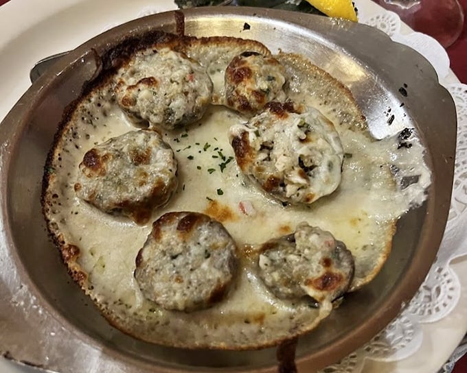 Crab-stuffed mushrooms bubbling with cheese&mdash;the kind of appetizer that makes you seriously reconsider the concept of sharing plates.
