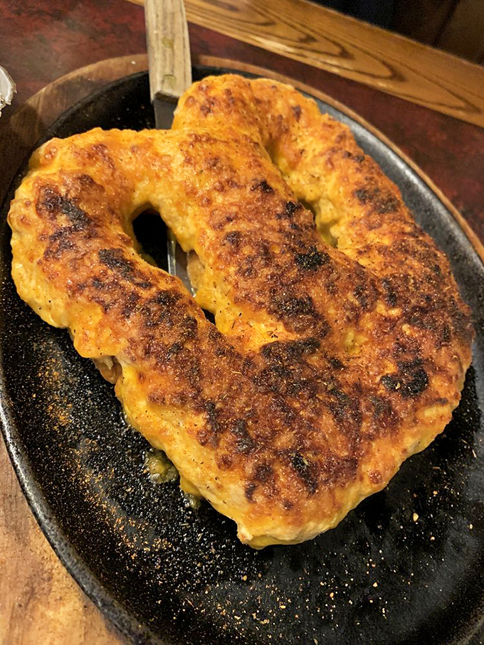That crab-stuffed pretzel is what happens when Pennsylvania pub culture crashes into a Maryland seafood festival—and everyone wins spectacularly.