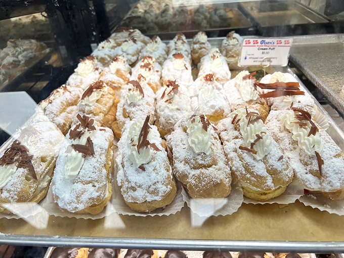 These cream puffs, dusted with powdered sugar and chocolate, aren't just desserts&mdash;they're little clouds of joy that make diets seem like a terrible idea.
