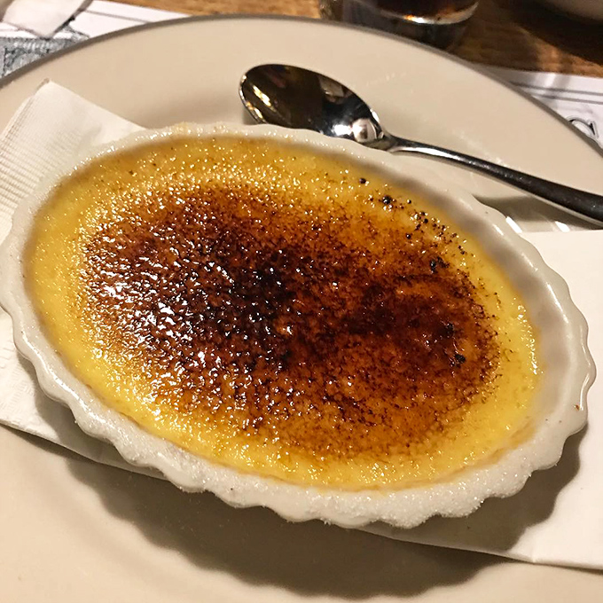 Cr&egrave;me br&ucirc;l&eacute;e with that perfect glass-like sugar crust &ndash; tap it with your spoon and listen for that satisfying crack before diving into custard heaven.