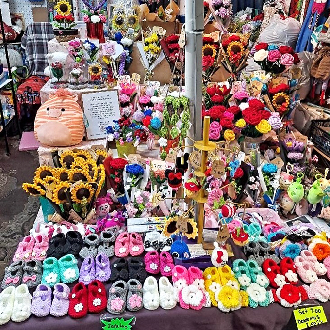 A kaleidoscope of handcrafted flowers and baby booties. Each tiny stitch represents hours of craftsmanship and a grandmother's worth of patience.