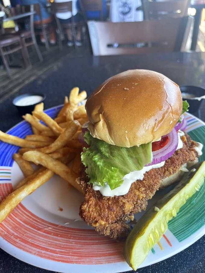 This sandwich doesn't just satisfy hunger&mdash;it conquers it. The crispy fish peeks out like it's trying to escape, but you'll catch it.