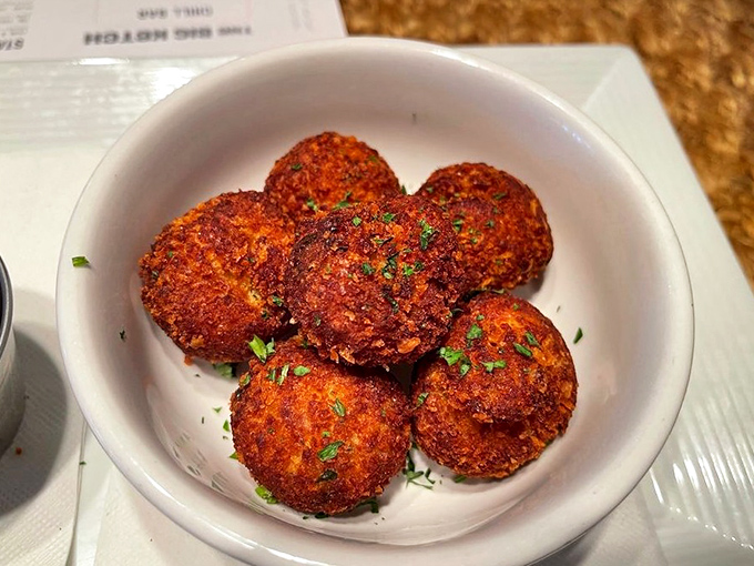 Hush puppies so perfectly golden they deserve their own trophy. Crispy outside, fluffy inside&mdash;the unsung heroes of any seafood feast.