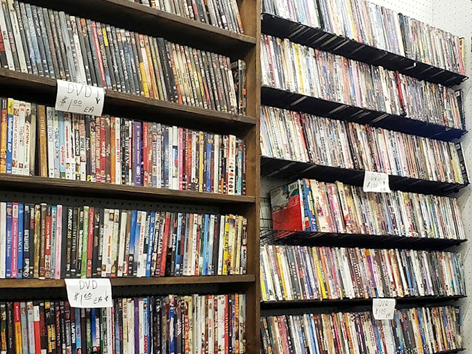 DVD shelves packed tighter than a Hollywood awards show—before streaming made us forget the joy of browsing physical media.