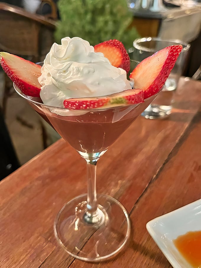 Fresh strawberries and whipped cream transform this cocktail glass into dessert territory&mdash;proof that Guerrera knows how to end a meal on a high note.