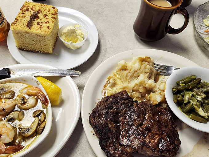 Steak and seafood share the spotlight with garden-fresh sides—proof that this kitchen knows its way around both land and sea.