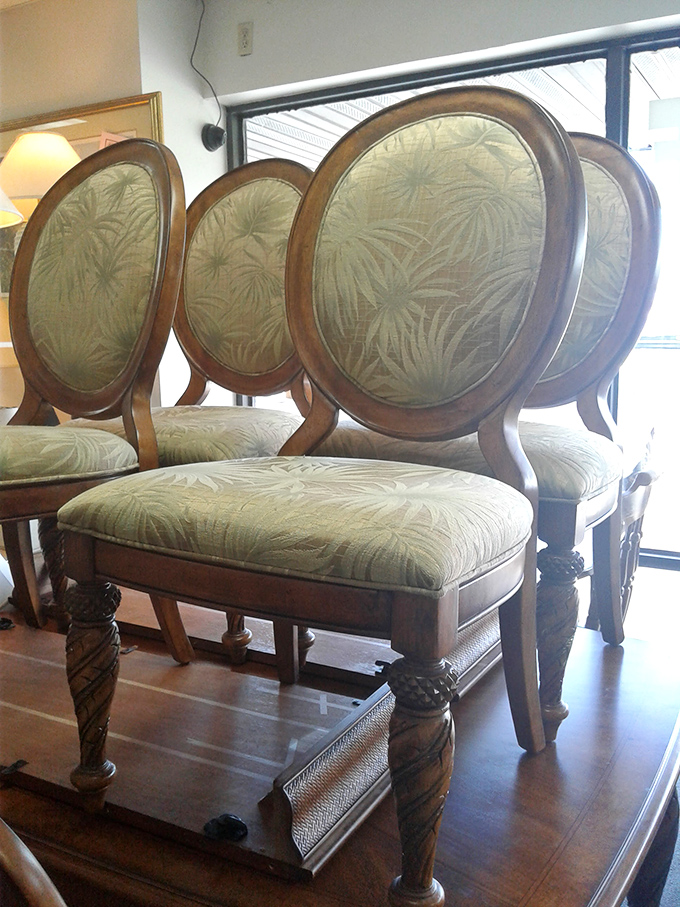 Elegant dining chairs waiting patiently for their next dinner party debut in someone's home.
