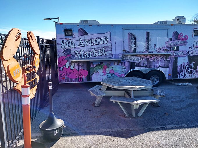 The market's branded food truck offers a moment of respite, with picnic tables inviting shoppers to rest their feet and plot their next bargain conquest.