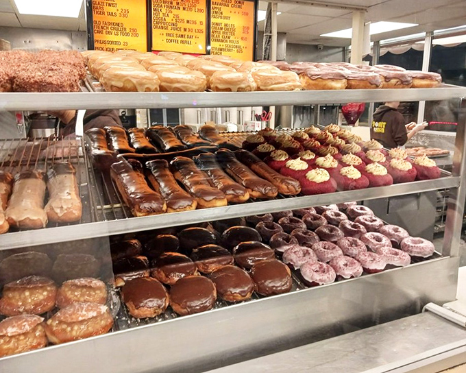 The display case at The Donut Man isn't just a showcase&mdash;it's a museum of edible art where glazed masterpieces await adoption.