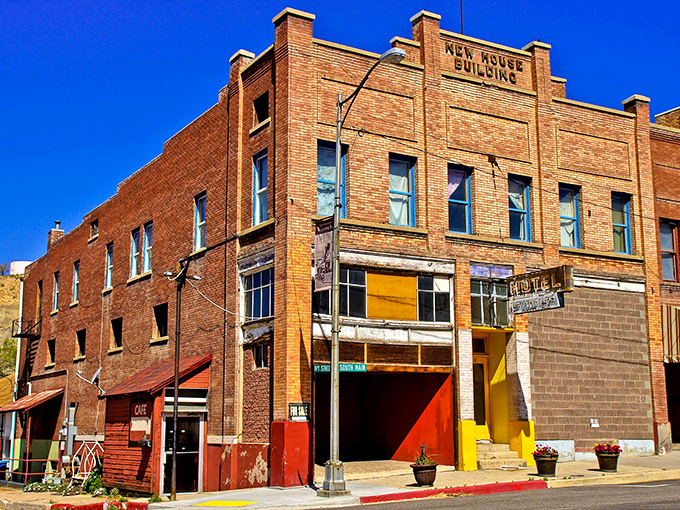 The New Asher Building stands as a testament to brick craftsmanship and early 20th-century optimism, with splashes of modern color bringing it into the present.