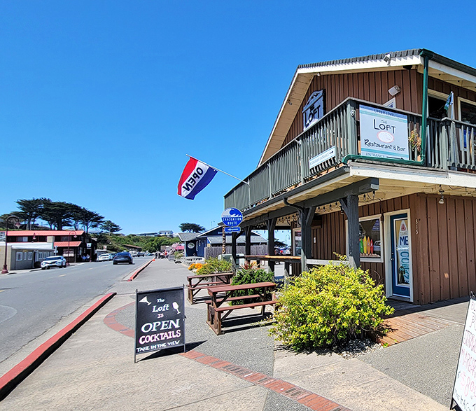 The Loft Restaurant's outdoor seating beckons with the promise of ocean breezes and locally-inspired cuisine &ndash; coastal dining at its most authentic.