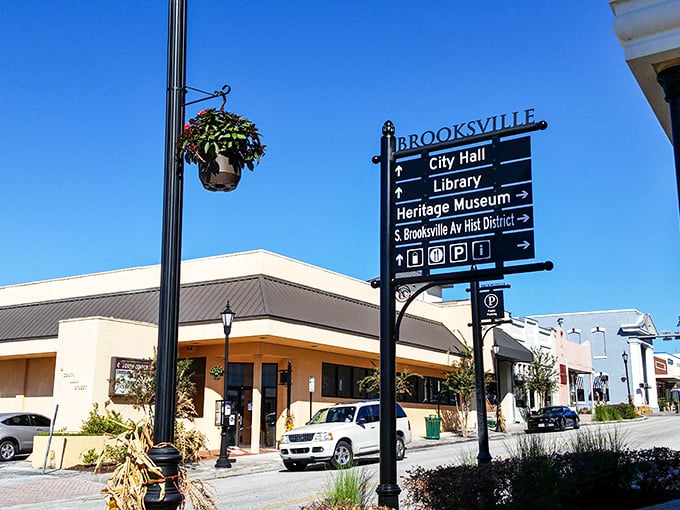 Brooksville's directional signs point visitors to local treasures, while hanging flower baskets add touches of color to downtown streets.