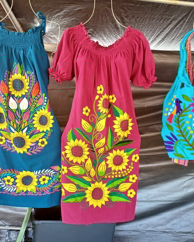 Vibrant Mexican-inspired dresses burst with sunflower energy, bringing a splash of color that would make Frida Kahlo nod in approval.