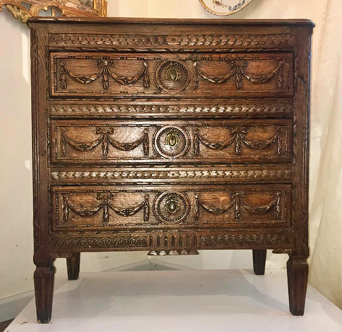 This isn't just a dresser; it's a masterclass in craftsmanship with details that would make today's furniture makers weep.