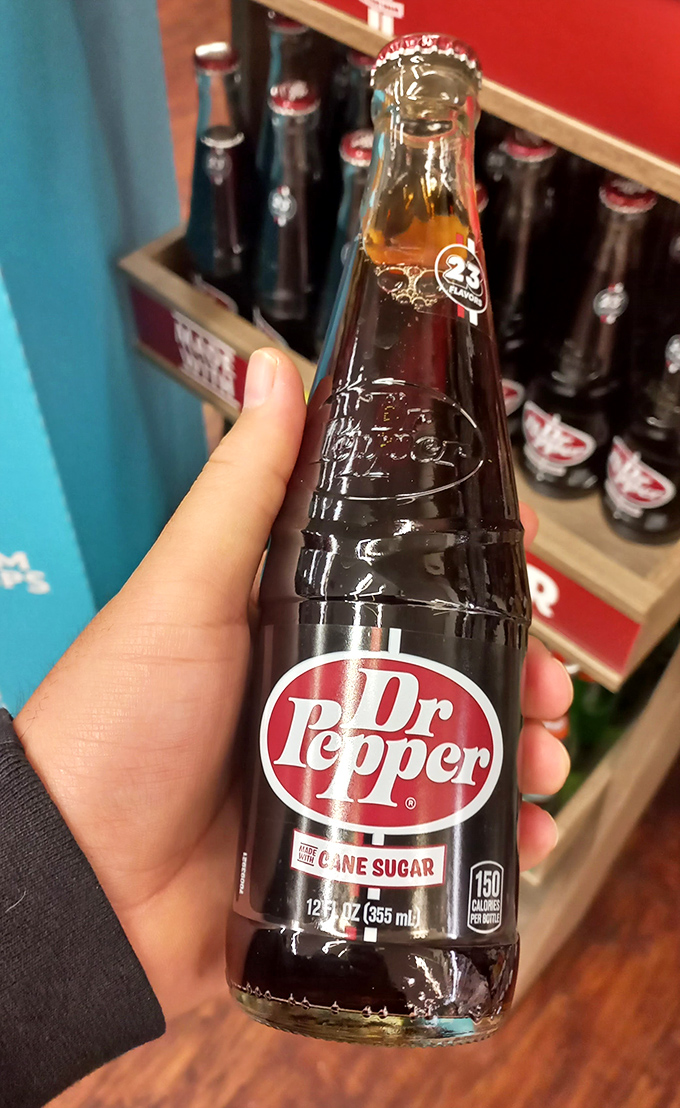 A bottle of Dr Pepper that looks like it time-traveled here from a Norman Rockwell painting.