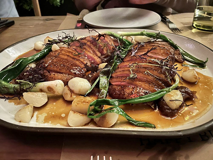 Duck breast cooked to ruby perfection, surrounded by seasonal vegetables. Proof that heaven exists and it's on a plate in San Francisco.