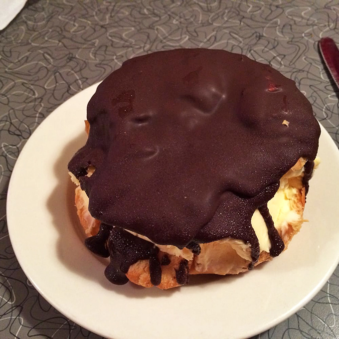 This chocolate-topped pastry isn't just dessert&mdash;it's therapy on a plate, with a chocolate coating thick enough to require a commitment.