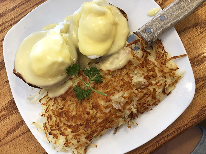 Classic eggs benedict with hollandaise so silky smooth, it makes other sauces jealous of its creamy perfection and golden color.