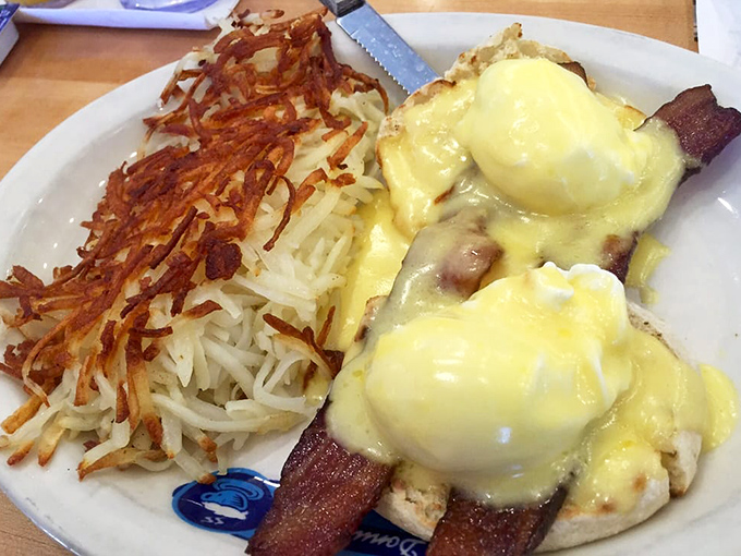 Eggs Benedict with crispy hash browns &ndash; breakfast's power couple that makes you wonder why anyone would ever skip the most important meal of the day.