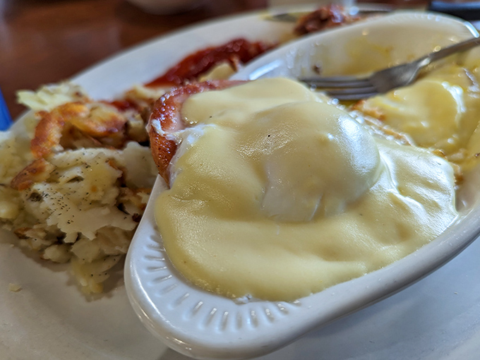 Eggs Benedict with hollandaise so rich it could buy a yacht. The breakfast of champions who plan to nap afterward.