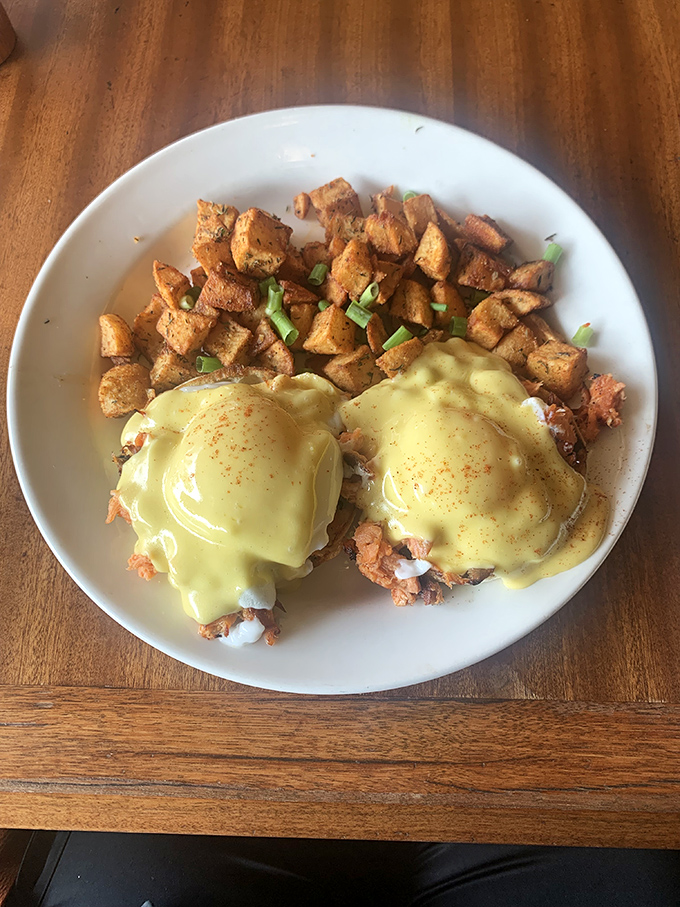 Eggs Benedict done right &ndash; perfectly poached eggs nestled on a base, draped in hollandaise that cascades like a yellow waterfall of deliciousness.