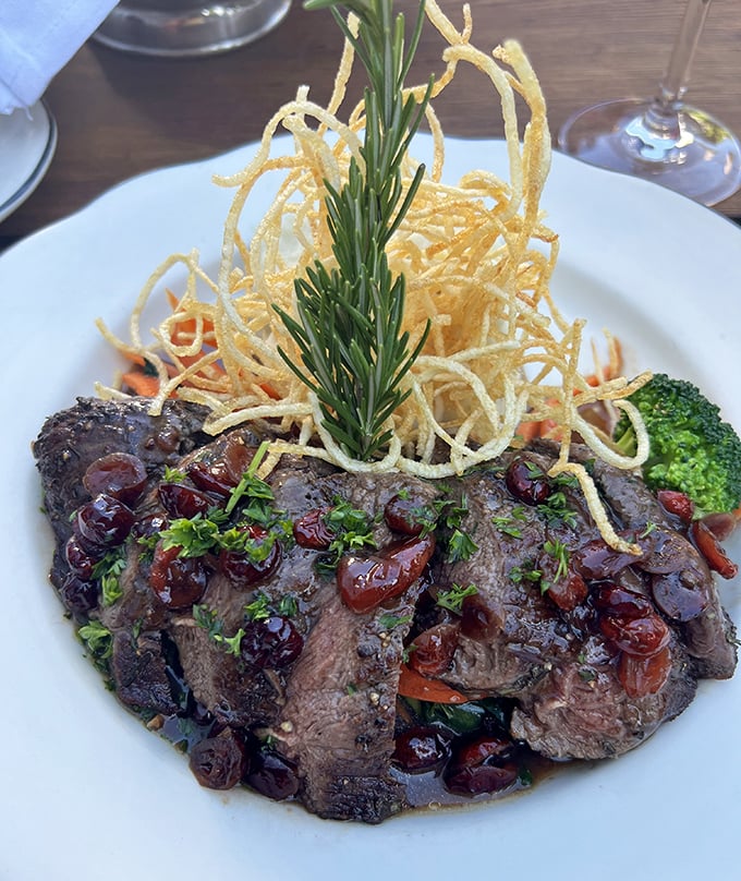 Elk medallions with cranberry sauce that would make Hemingway put down his pen and pick up his fork. Wild game tamed to perfection.