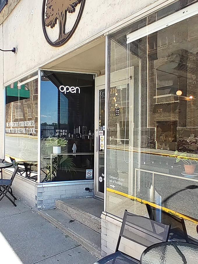 Elm City's welcoming storefront invites passersby to step in from the sidewalk and into a world where conversation flows as freely as the coffee. 