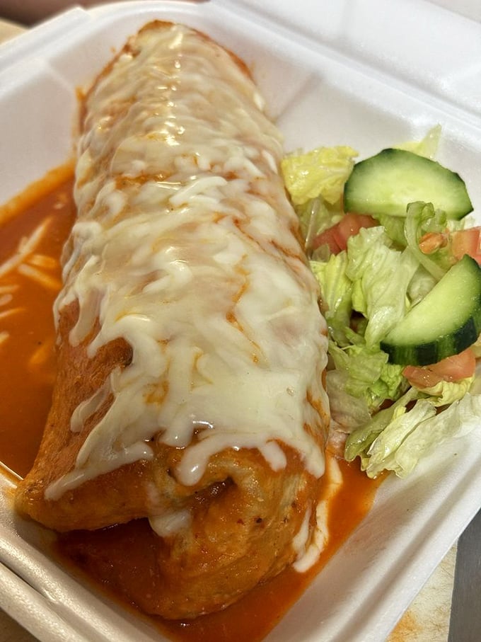 This enchilada isn't just food&mdash;it's a love letter wrapped in a tortilla, bathed in sauce, and blanketed with cheese that's melted to perfection.