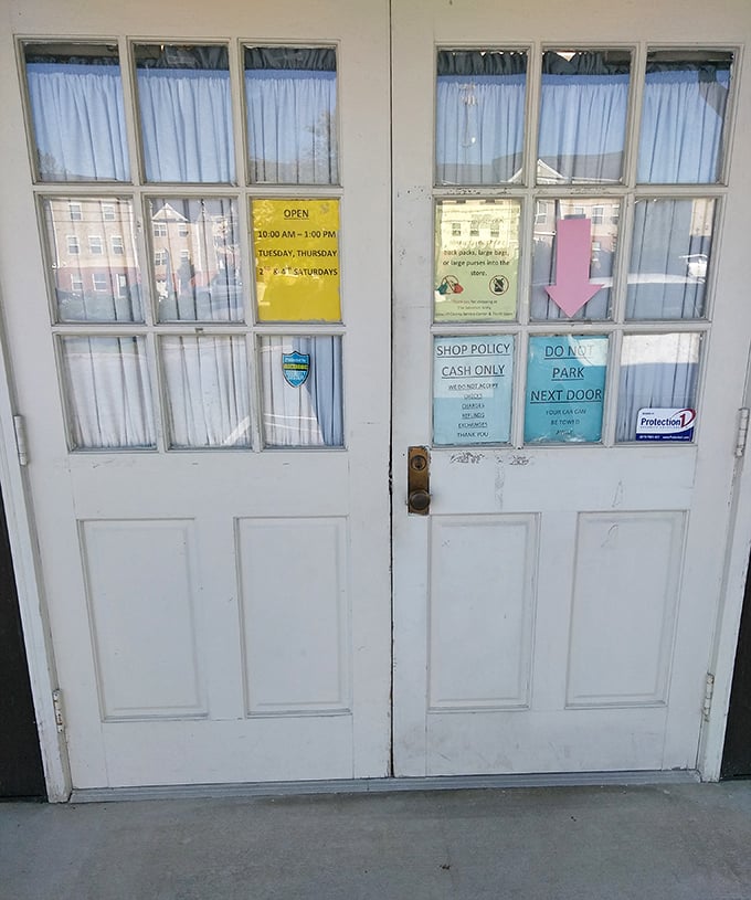 The rules of engagement clearly posted: Cash only, limited hours, and absolutely no parking next door &ndash; the thrift store equivalent of "look but don't touch."