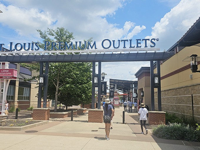 The grand entrance arch announces your arrival to the promised land of discounts, where full-price shopping trauma begins to heal.